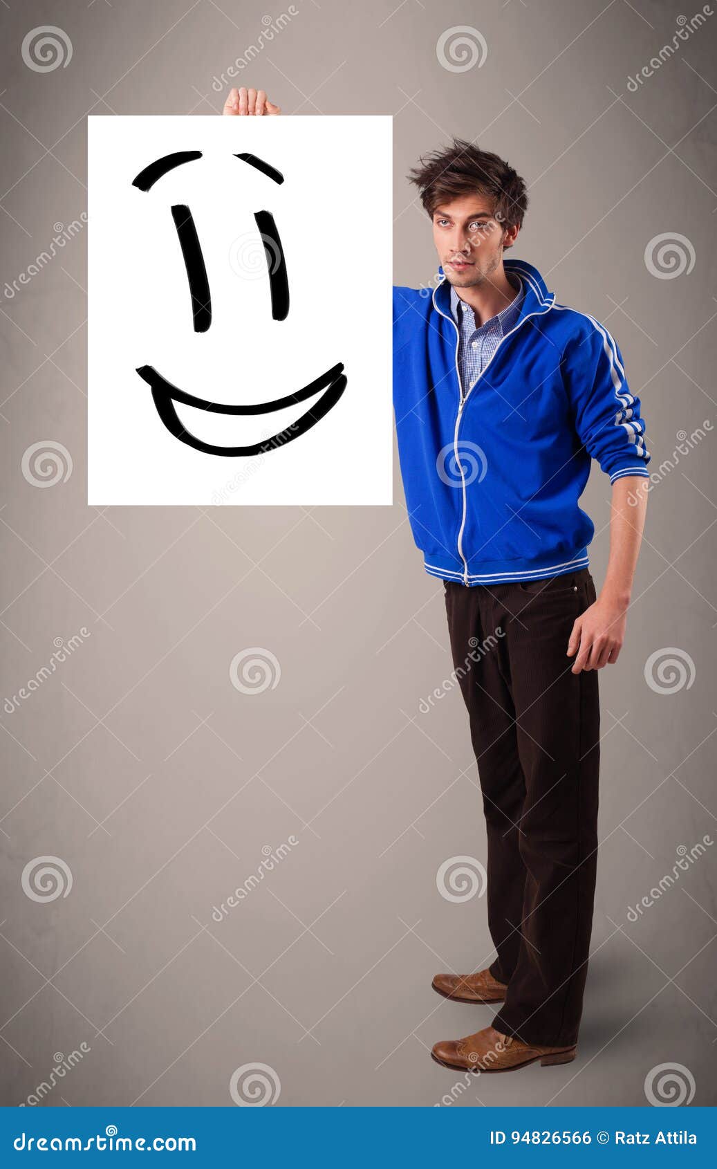 Young Boy Holding Smiley Face Drawing Stock Photo - Image of handsome ...