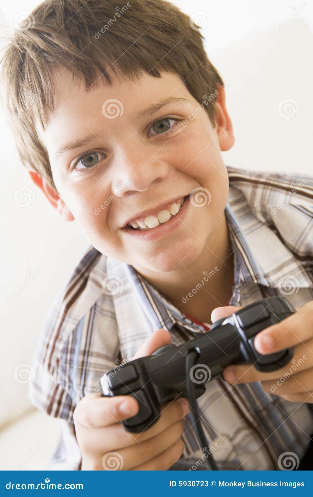 Young Boy Holding Video Game Controller Stock Image - Image of indoors ...