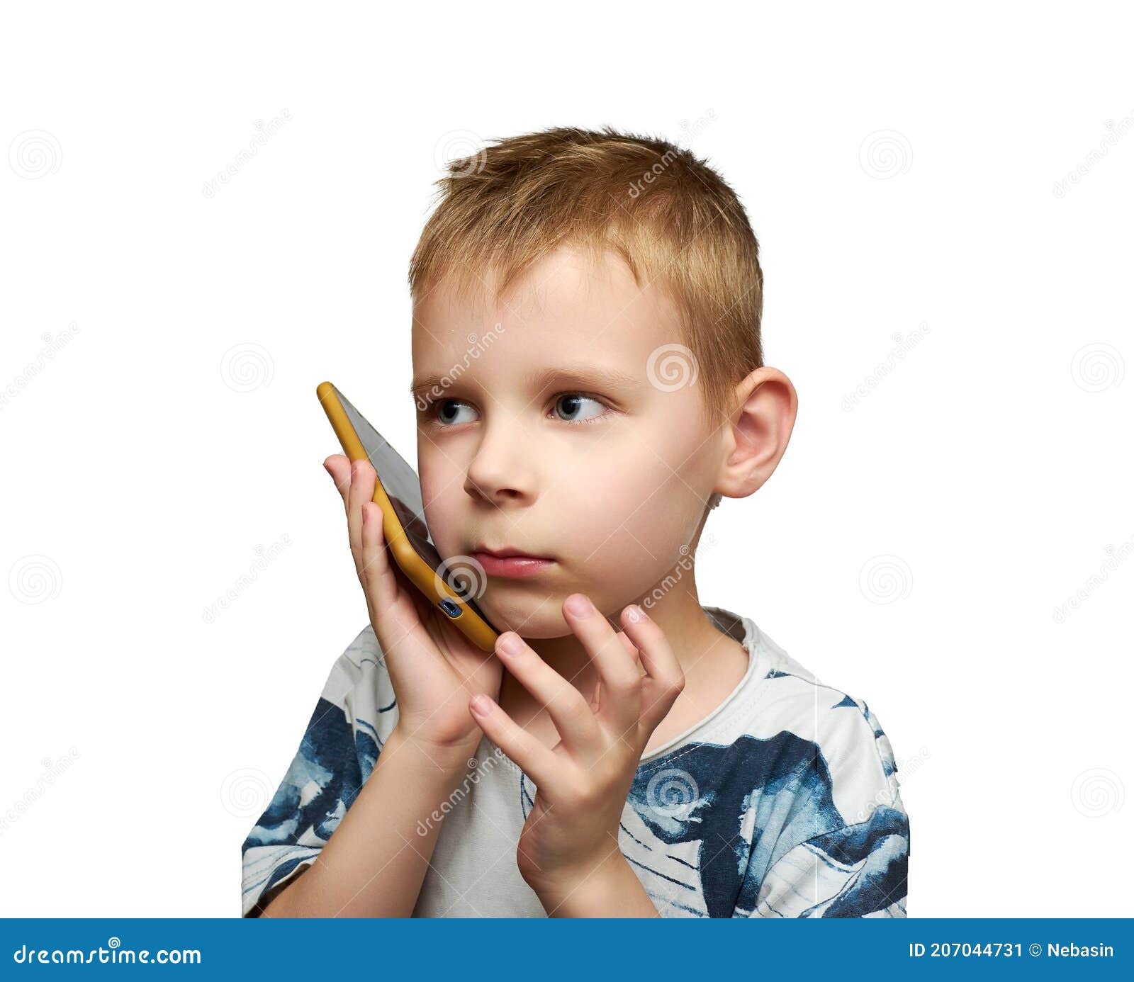 Young Boy Holds a Mobile Phone. Isolated on White Stock Image - Image ...