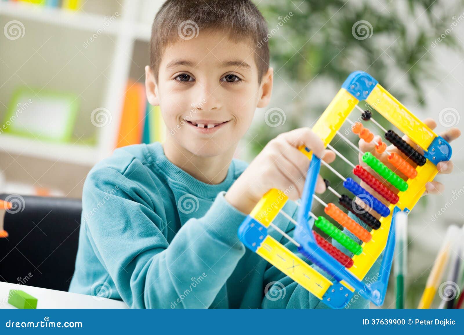 Young Boy at Home Working on the Abacus Stock Photo - Image of ...