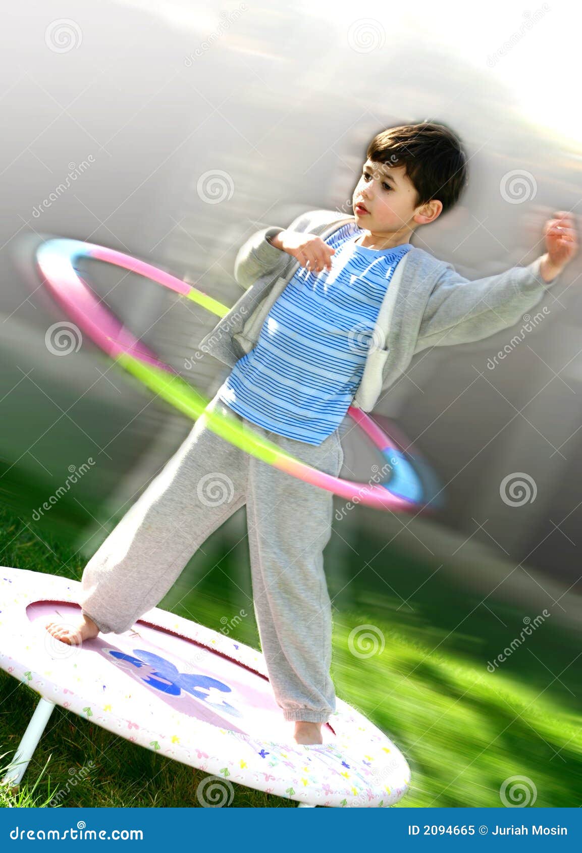 A Young Boy with a Hoola Hoop Stock Image - Image of joyful ...
