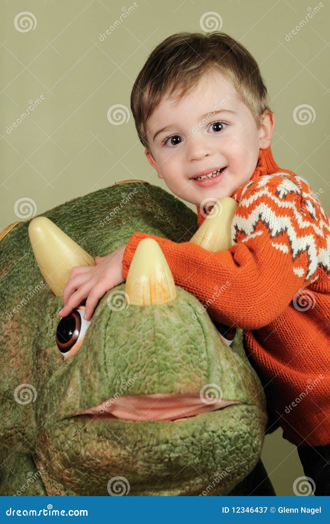 Young boy hugging dinosaur stock image. Image of tyrannosaurus - 12346437
