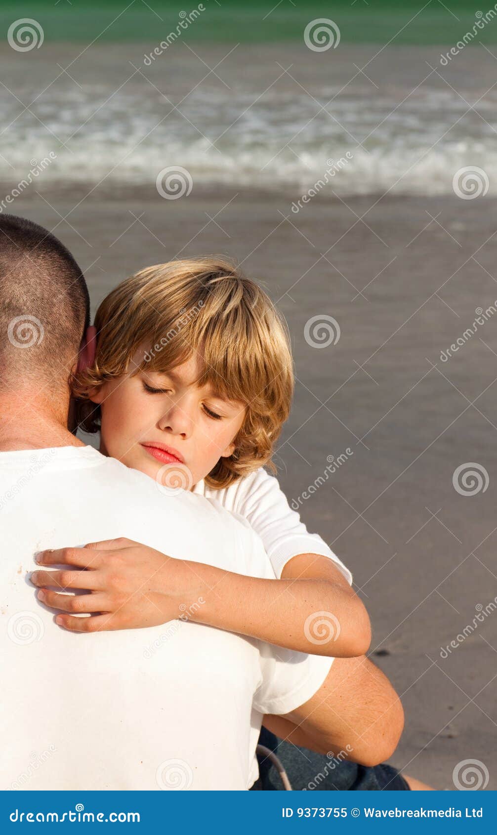 Young Boy Hugging His Father Stock Image - Image of affectionate, ocean ...
