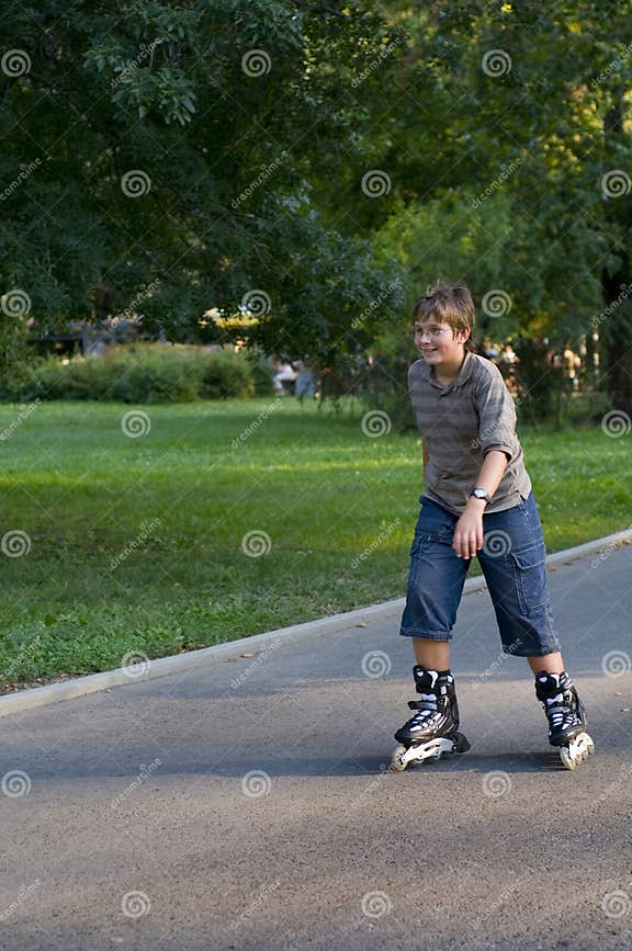 Young boy inline skating stock photo. Image of rollerblading - 10736020