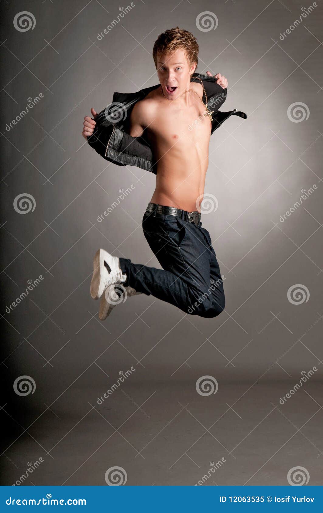 Young boy jumping stock image. Image of concentrated - 12063535