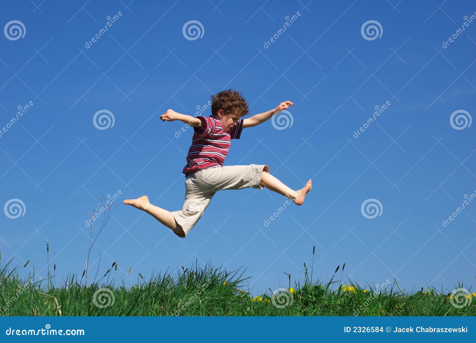 Young boy jumping stock photo. Image of relax, people - 2326584