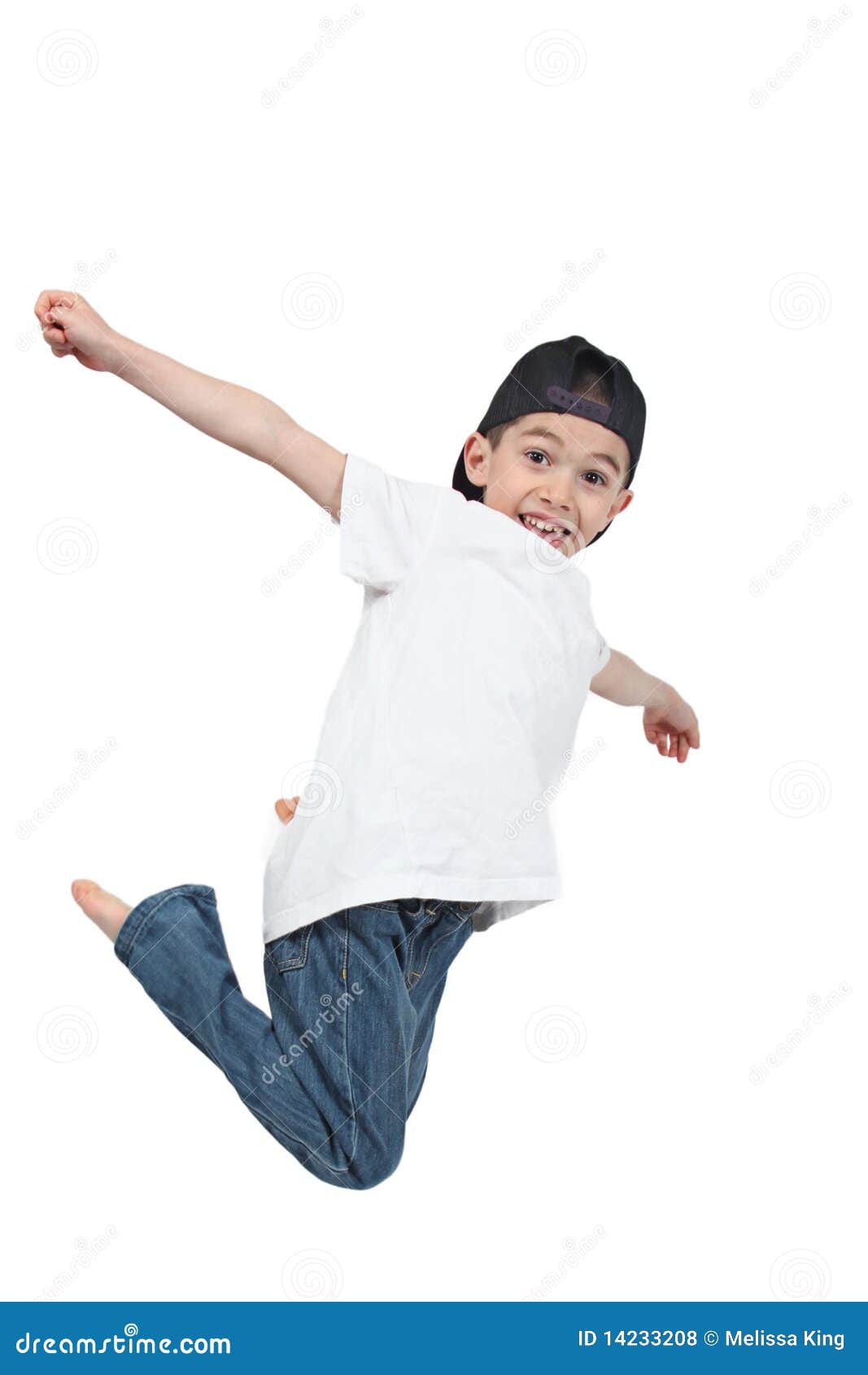 Young boy jumping with joy stock photo. Image of kiddie - 14233208