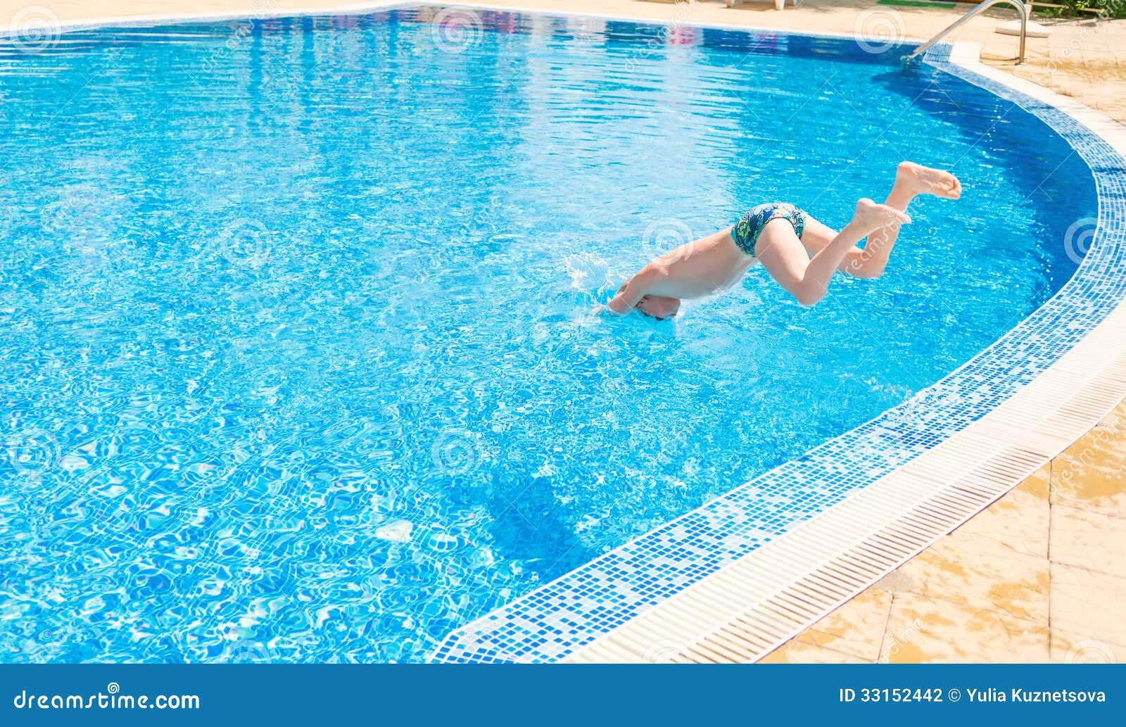 Young Boy Jumping into Swimming Pool Stock Photo - Image of glasses ...