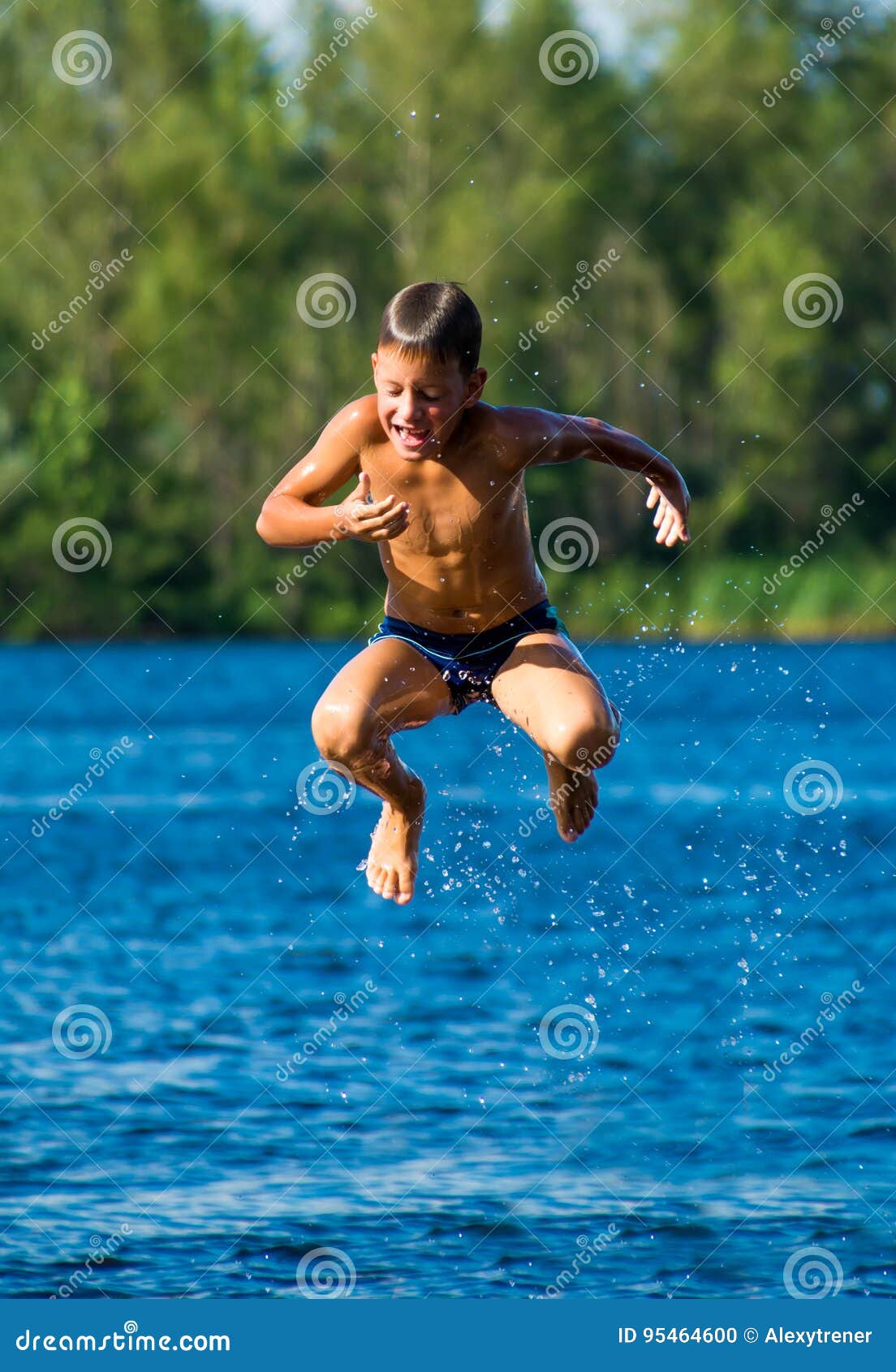 Young Boy Jumping into Water Stock Photo - Image of outside, adventure ...