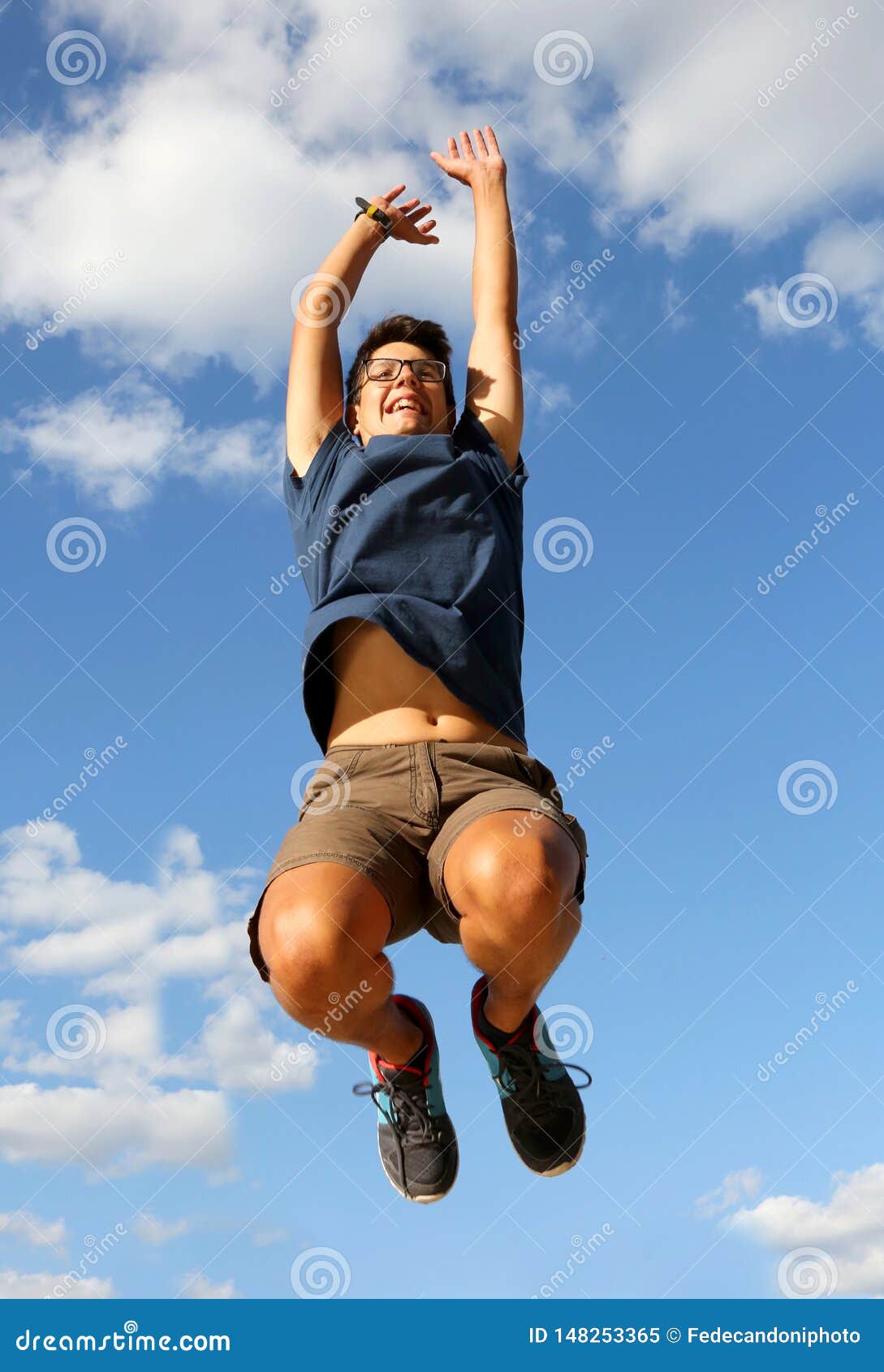 Young boy on blue sky stock image. Image of amusement - 148253365