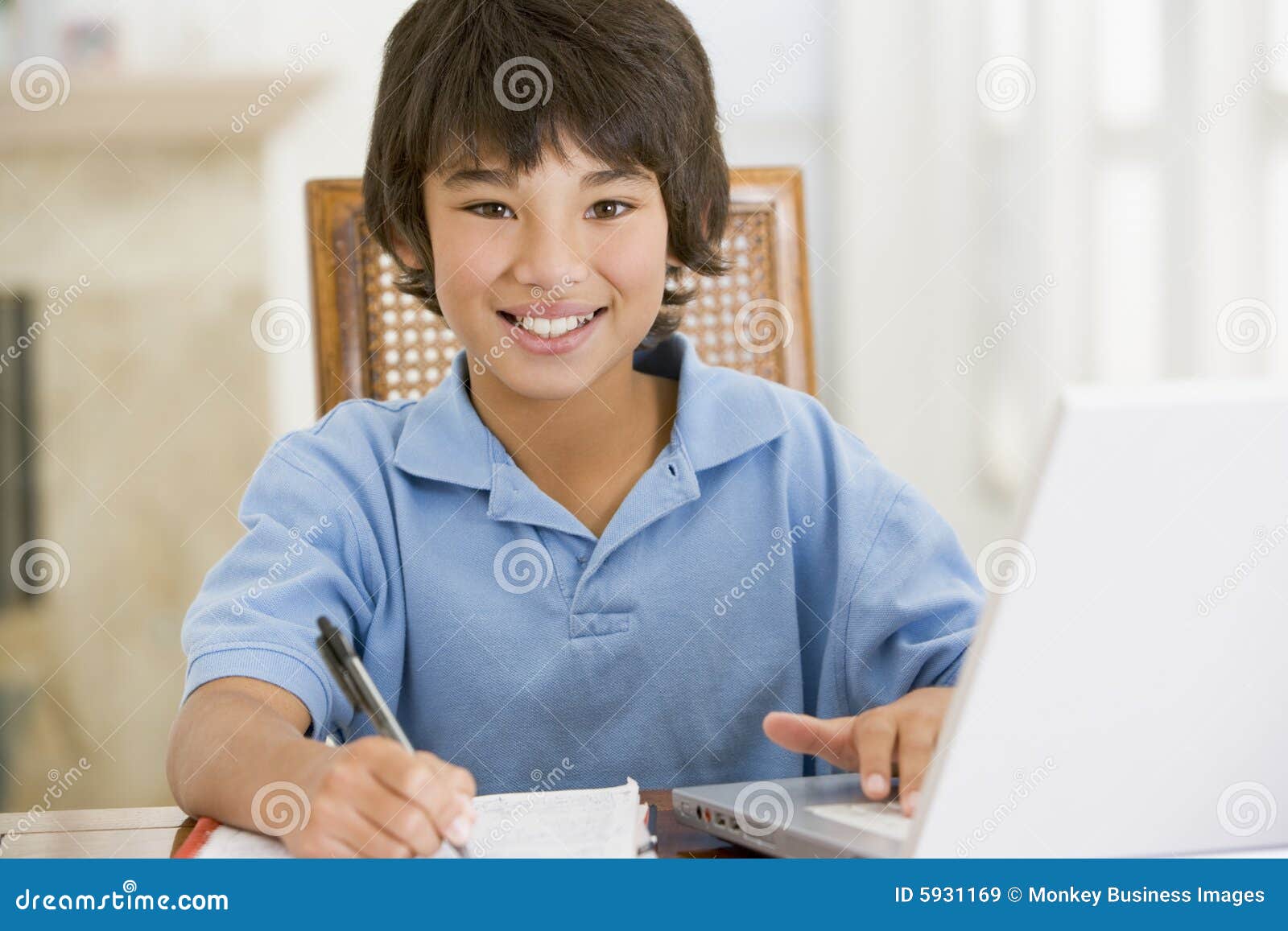 Young Boy with Laptop Doing Homework Stock Image - Image of asian ...