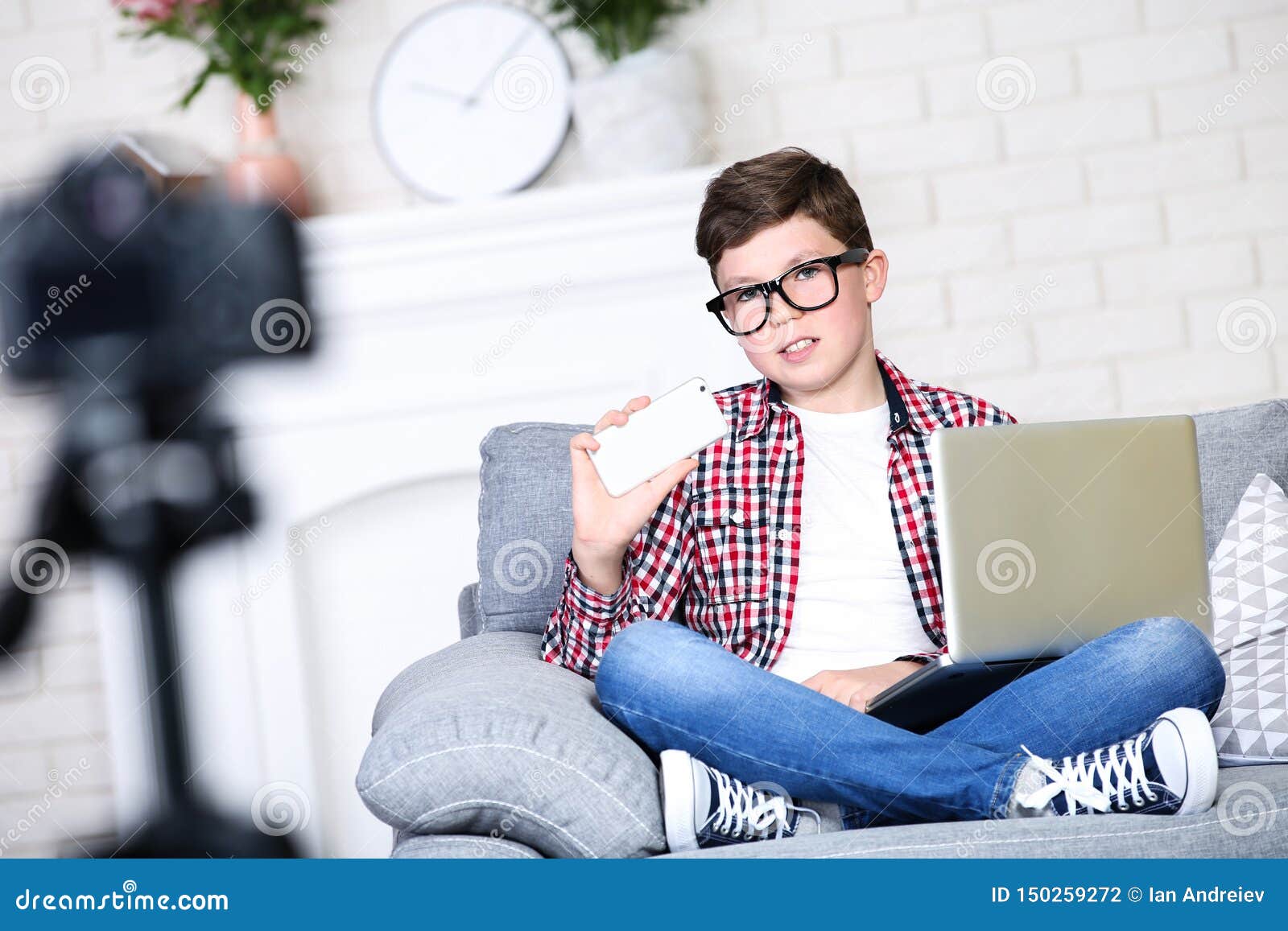 Boy with Laptop Sitting on Sofa Stock Photo - Image of notebook, people ...