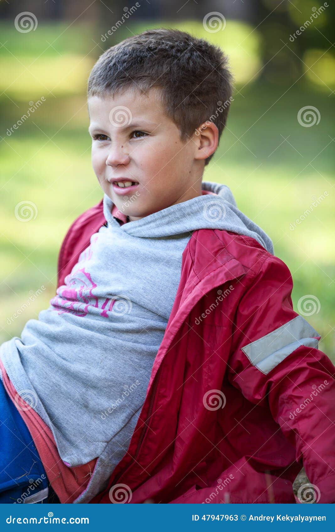 Young Boy Laying on Back in Grass, Close-up Cropped View Stock Image ...