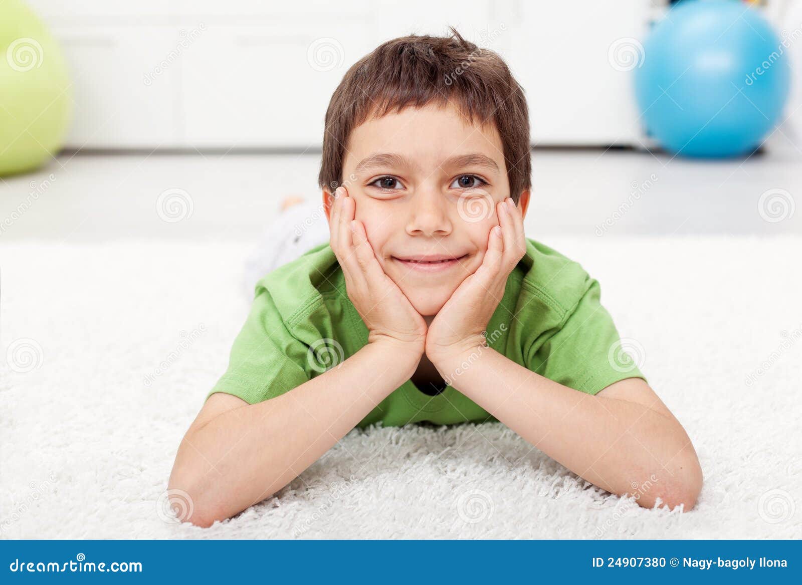 Young Boy Laying on the Floor Stock Photo - Image of happiness, little ...