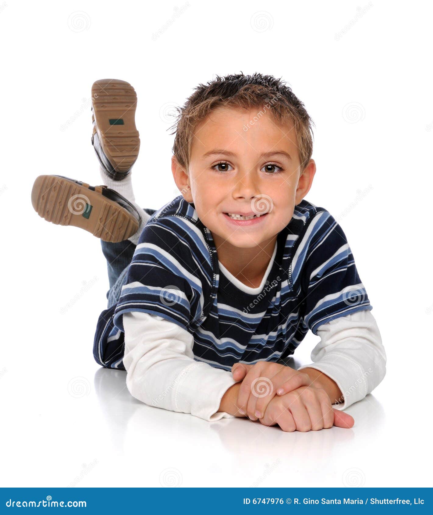 Young Boy Laying on Floor stock photo. Image of person - 6747976