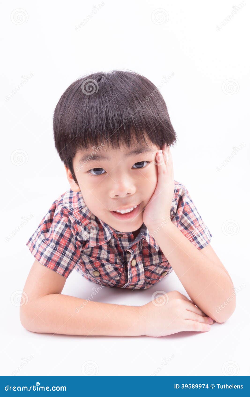 Young Boy Laying On The Floor Stock Photo | CartoonDealer.com #39589974