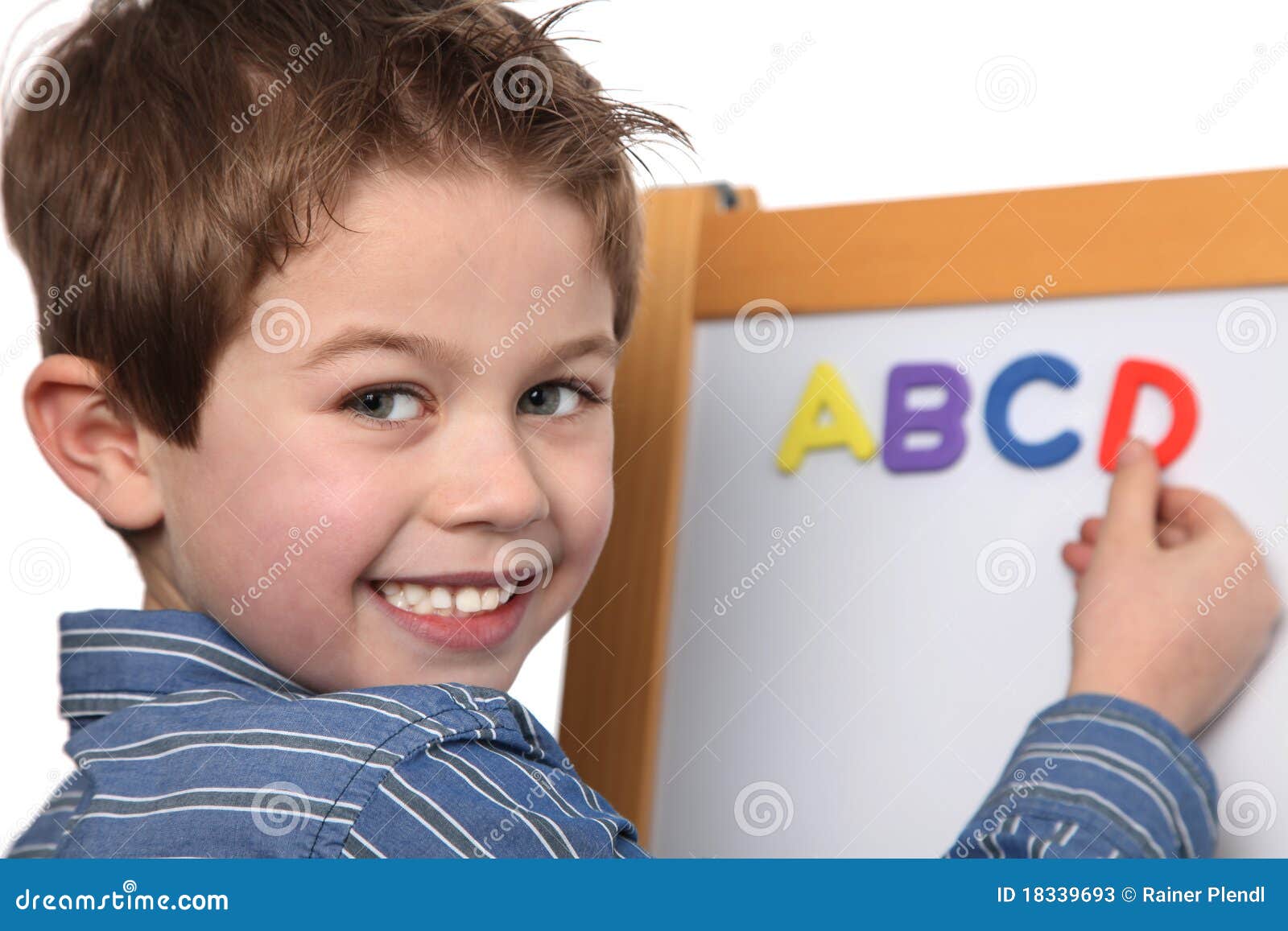 Young boy learning the ABC stock image. Image of face - 18339693