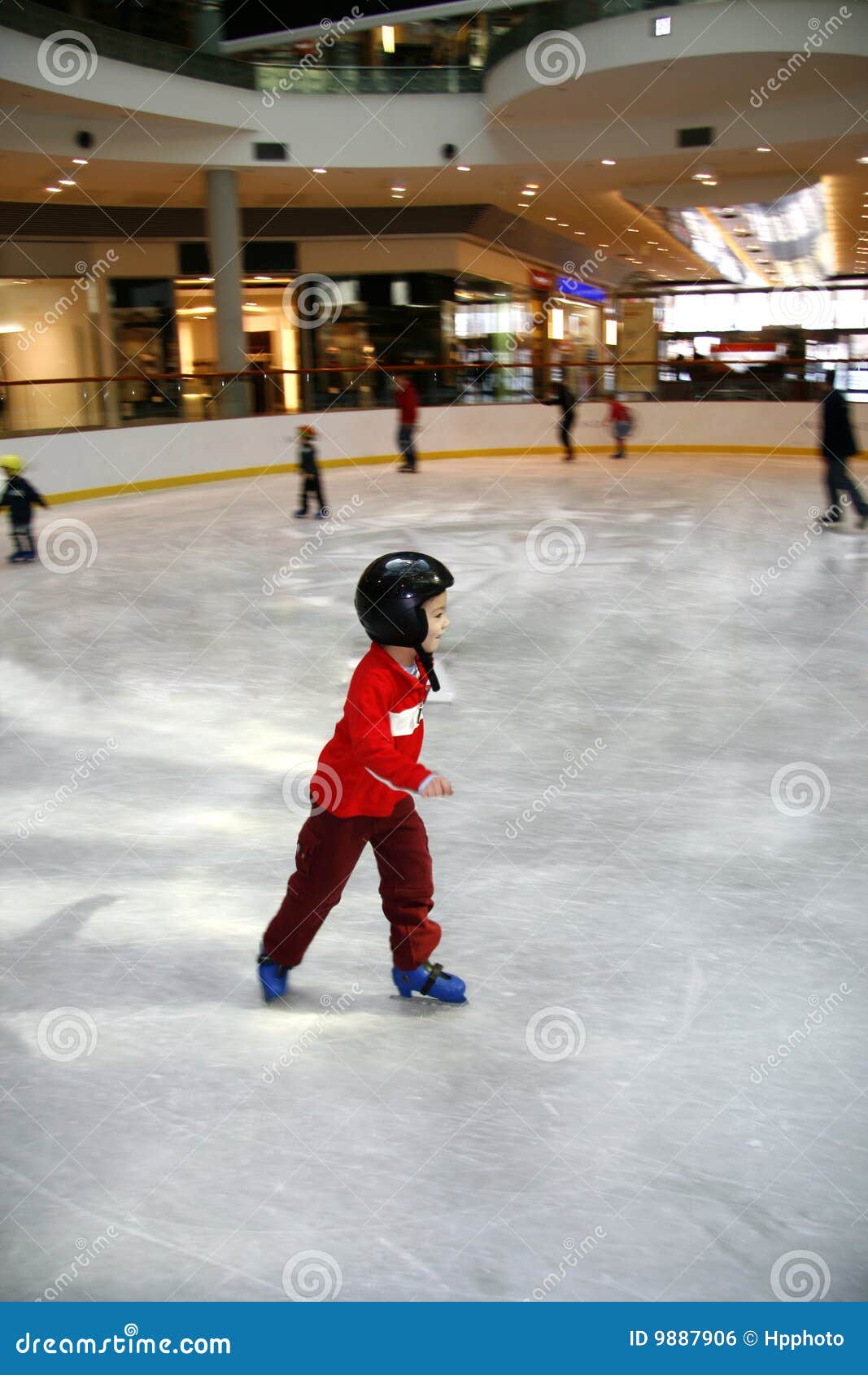 Young Boy Learning To Skate Stock Photo - Image of slide, cute: 9887906