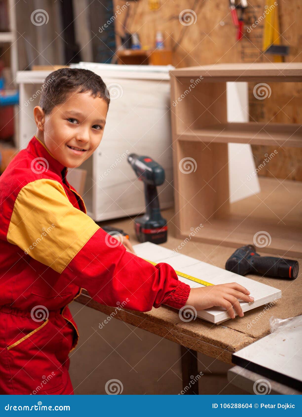 Boy Learning Wood Carving. Young Carpenter Working in a Workshop Stock ...