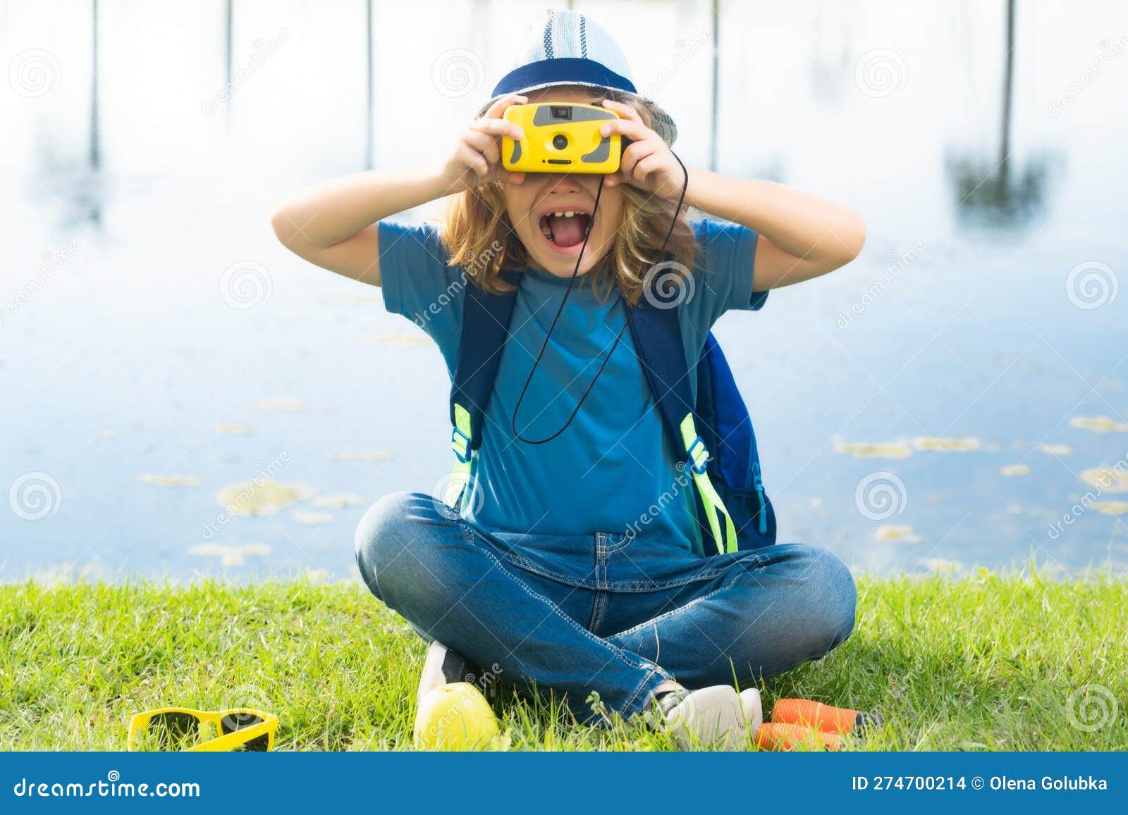 Young Boy Looking through Binoculars. Scout Boy Wearing Explorer Hat and Backpack Outdoor ...
