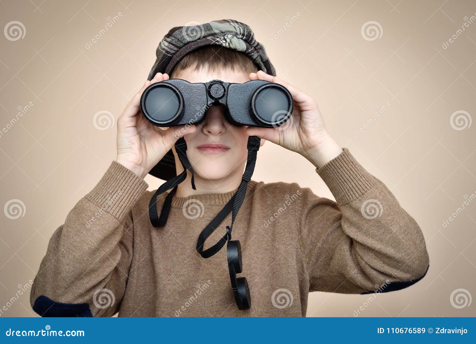 Young Boy Looking through Binoculars Stock Image - Image of face ...