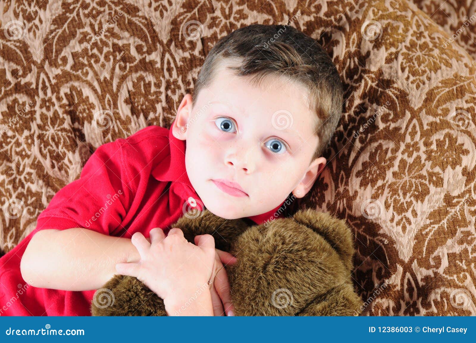 Young Boy Looking Concerned Stock Image - Image of withdrawn, emotion ...