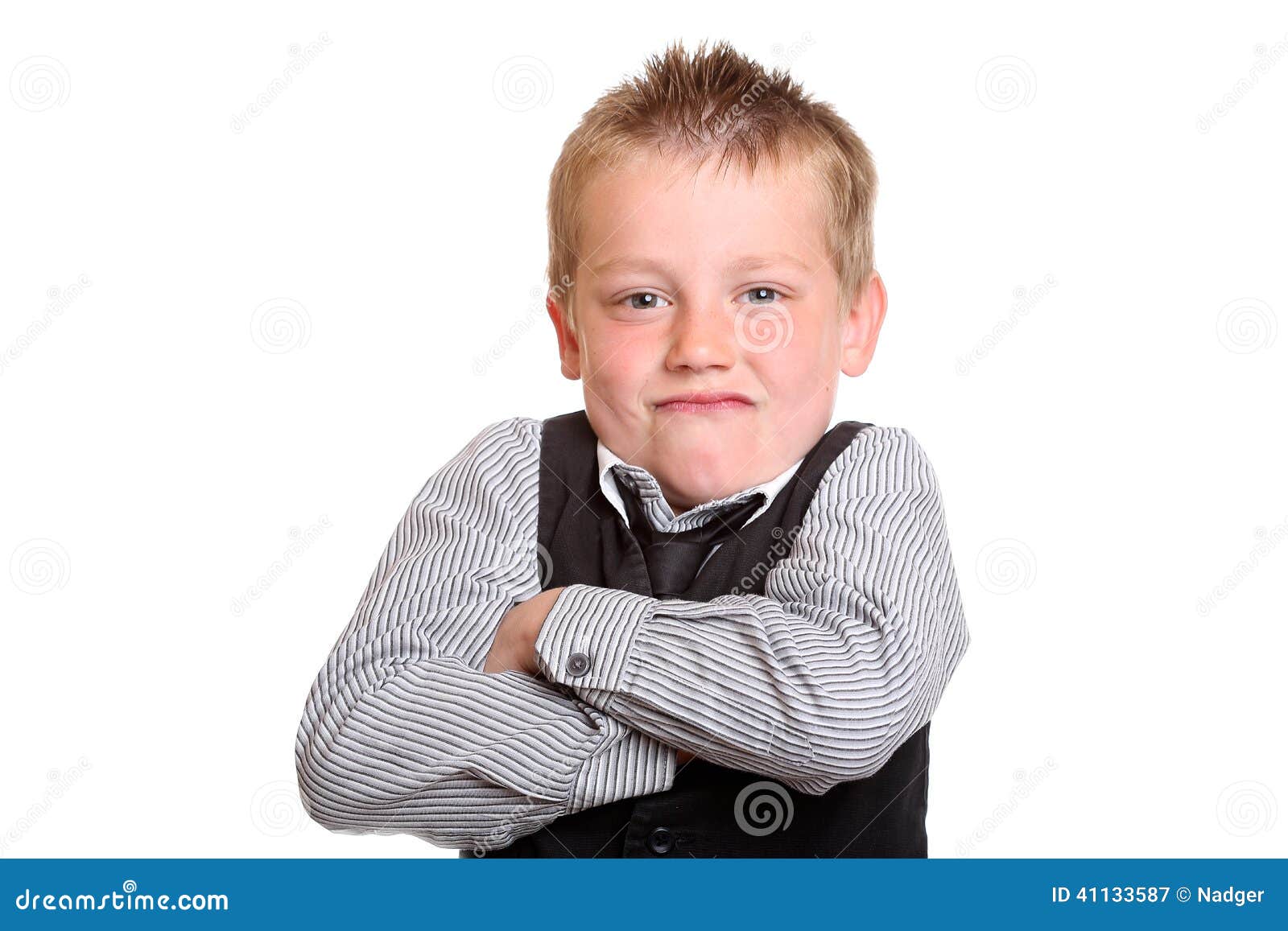 Young boy looking grumpy stock image. Image of waistcoat - 41133587