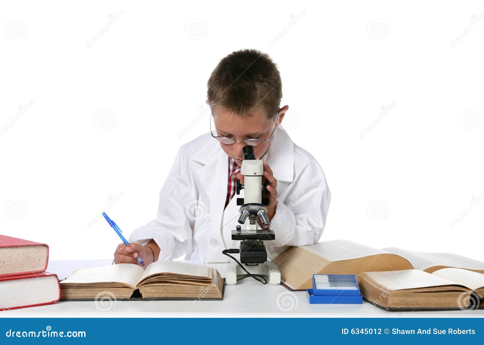 Young Boy Looking through Microscope Stock Photo - Image of child, look ...
