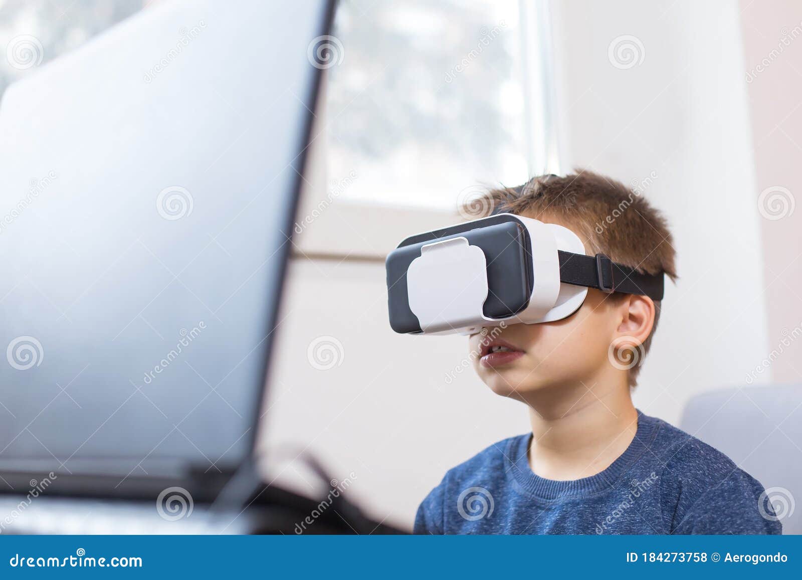 Young Boy Looking through VR Goggles Stock Photo - Image of play ...