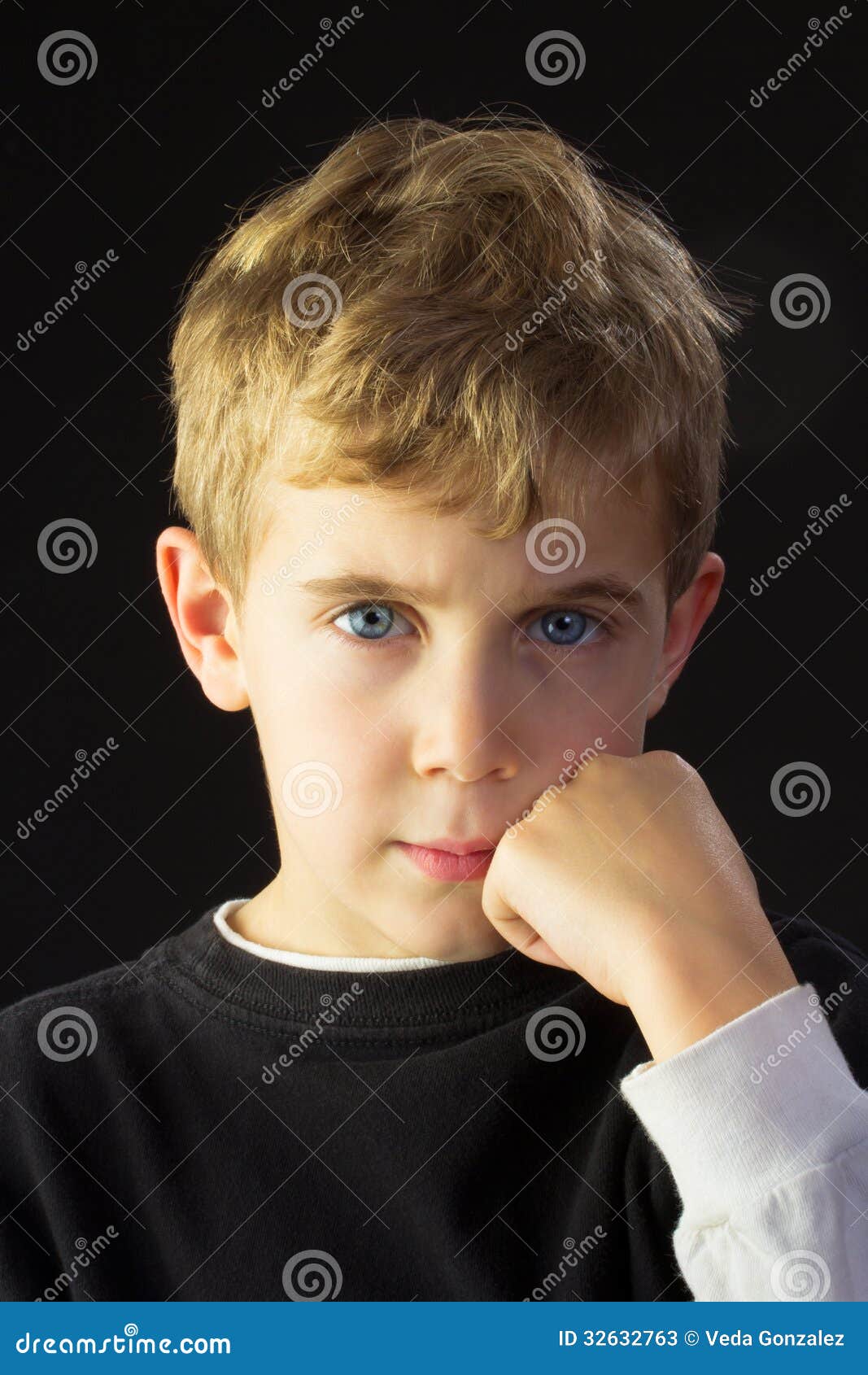 Young Boy Looks Angry stock image. Image of emotion, unhappy - 32632763
