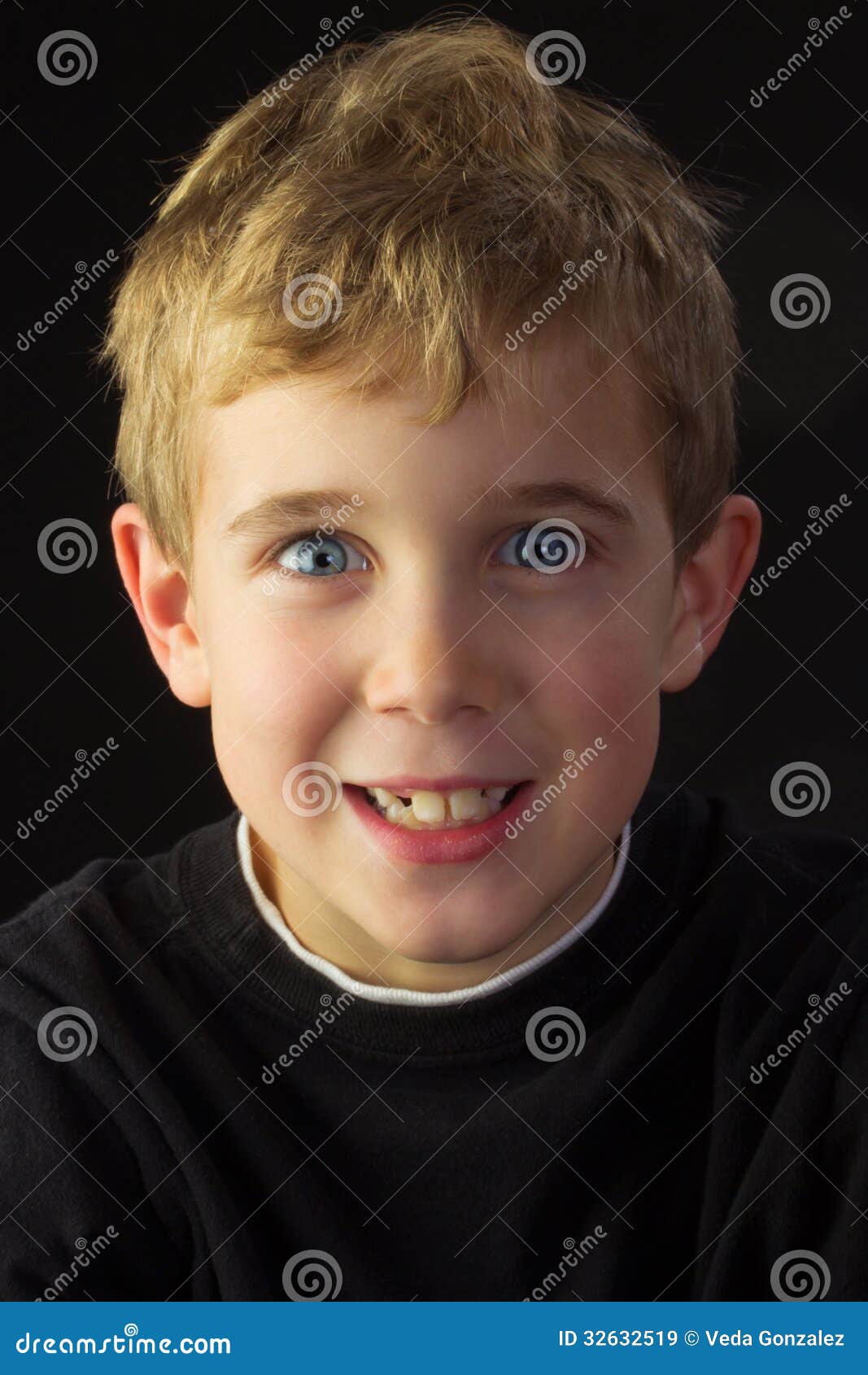Young Boy Looks Quite Mischievious Stock Image - Image of young ...
