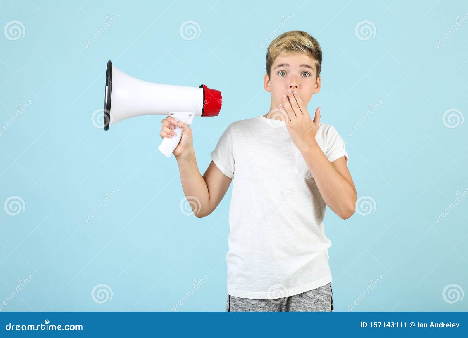 Boy with megaphone stock image. Image of beautiful, blue - 157143111