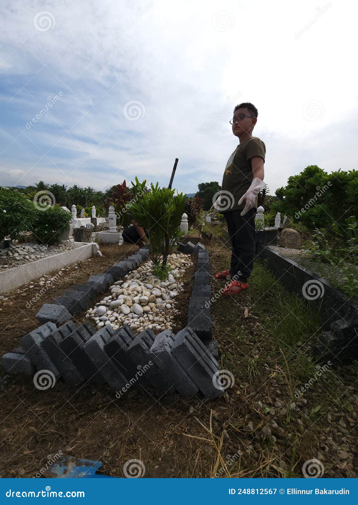 Young Boy at the Muslim Graveyard. Stock Image - Image of person ...