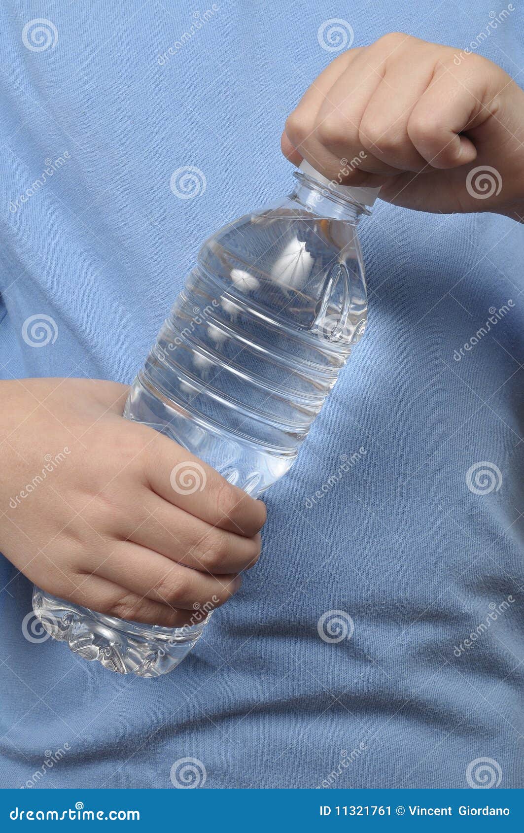 Young Boy Opening a Water Bottle Stock Image - Image of cold, hydrate ...