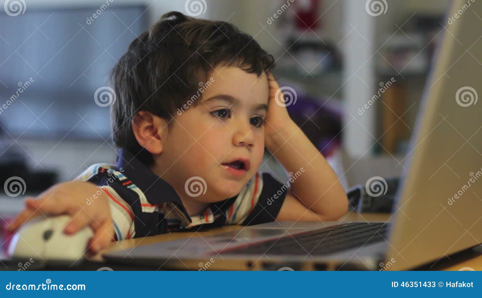 Young Boy Operating Educational Game on a Laptop Stock Video - Video of ...