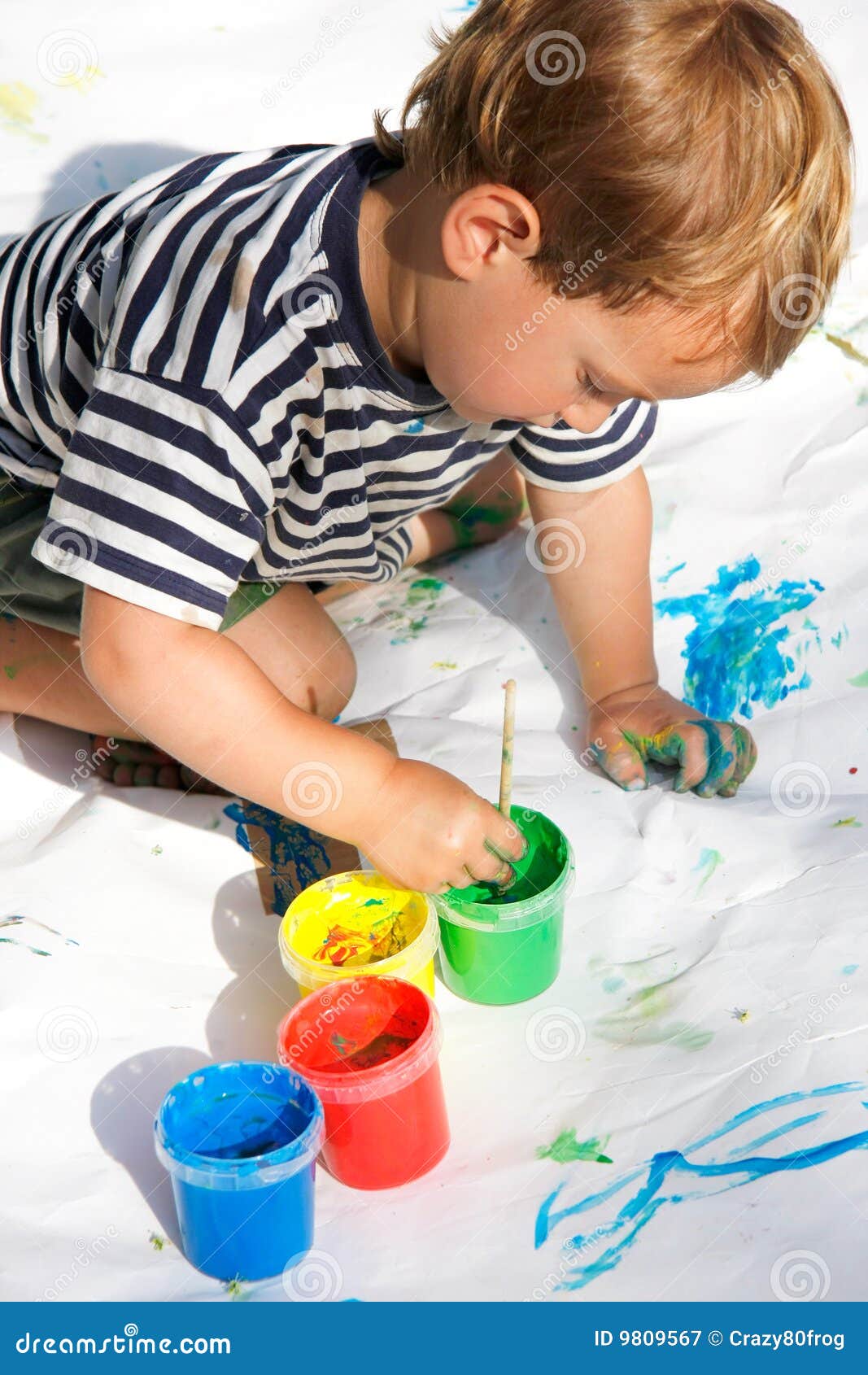 Young boy painting stock image. Image of male, learning - 9809567