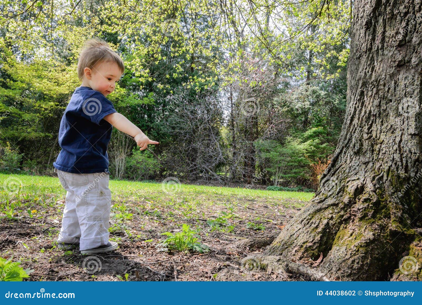 Boy Pointing Down Stock Photo | CartoonDealer.com #4054632