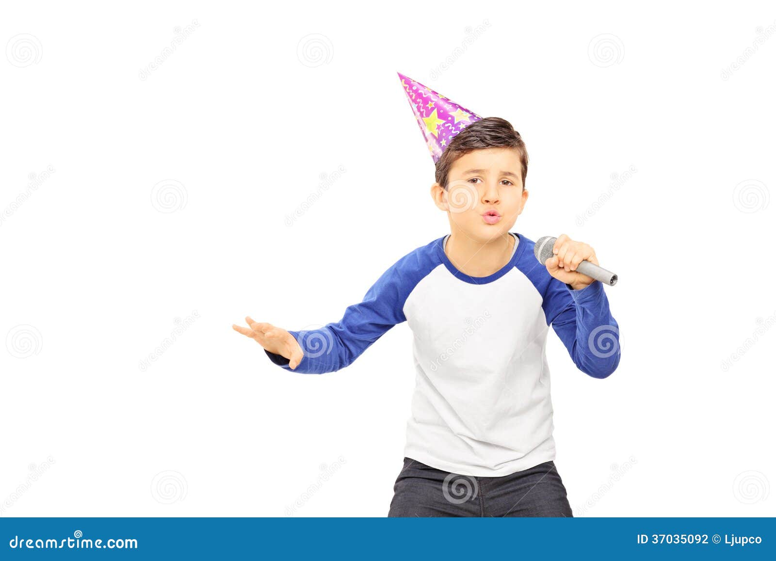 Young Boy with Party Hat Singing on Microphone Stock Photo - Image of ...