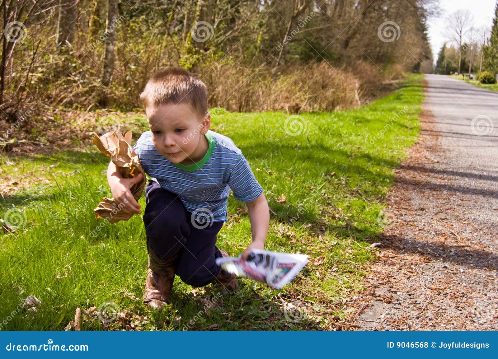 Young Boy Picking Up Garbage - Ecology Stock Photography ...