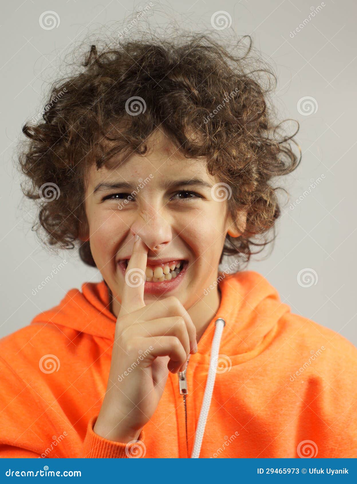 A young boy picks his nose stock image. Image of nostril - 29465973