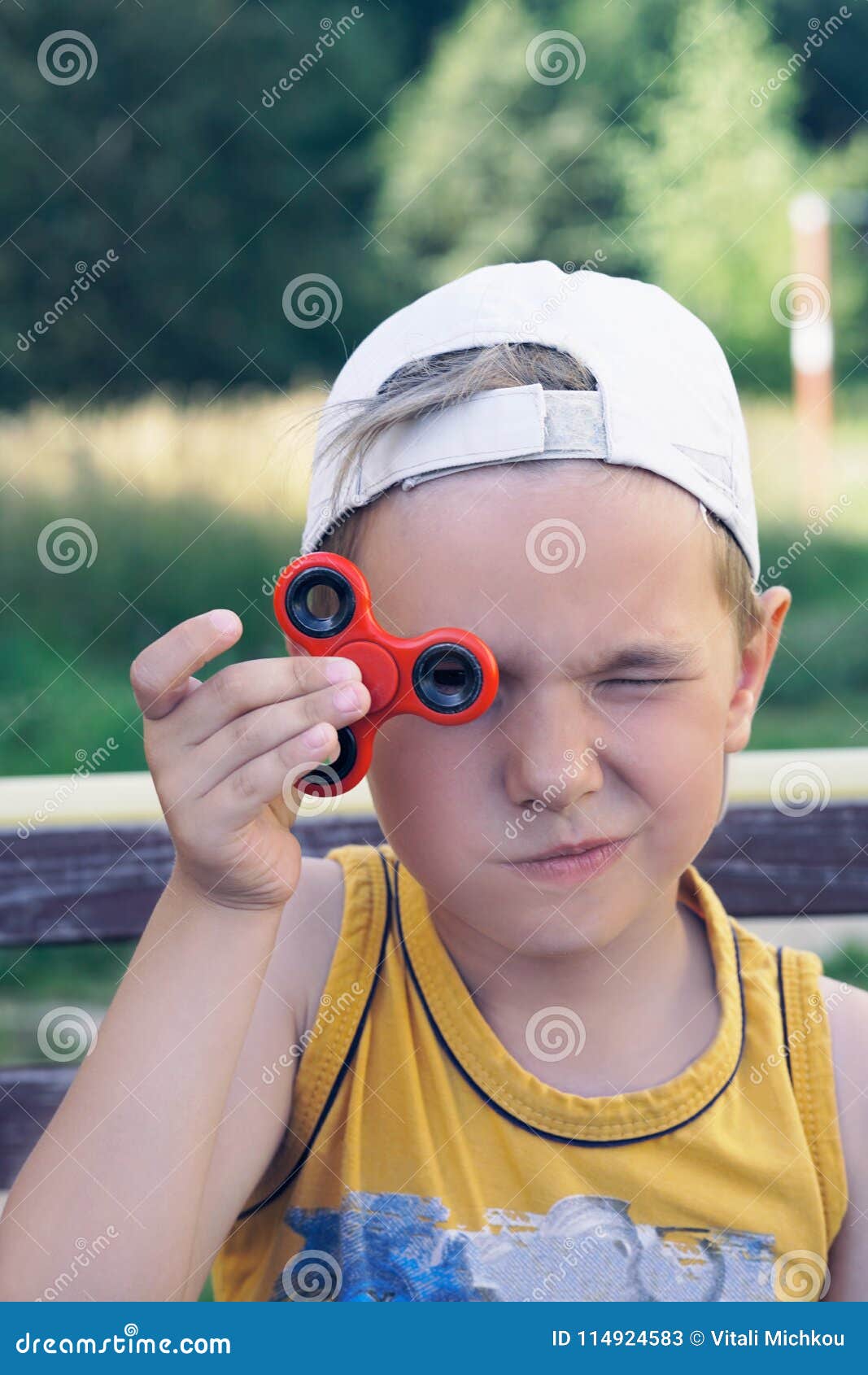 Young Boy Play with Fidget Spinner Stress Relieving Toy Stock Image ...