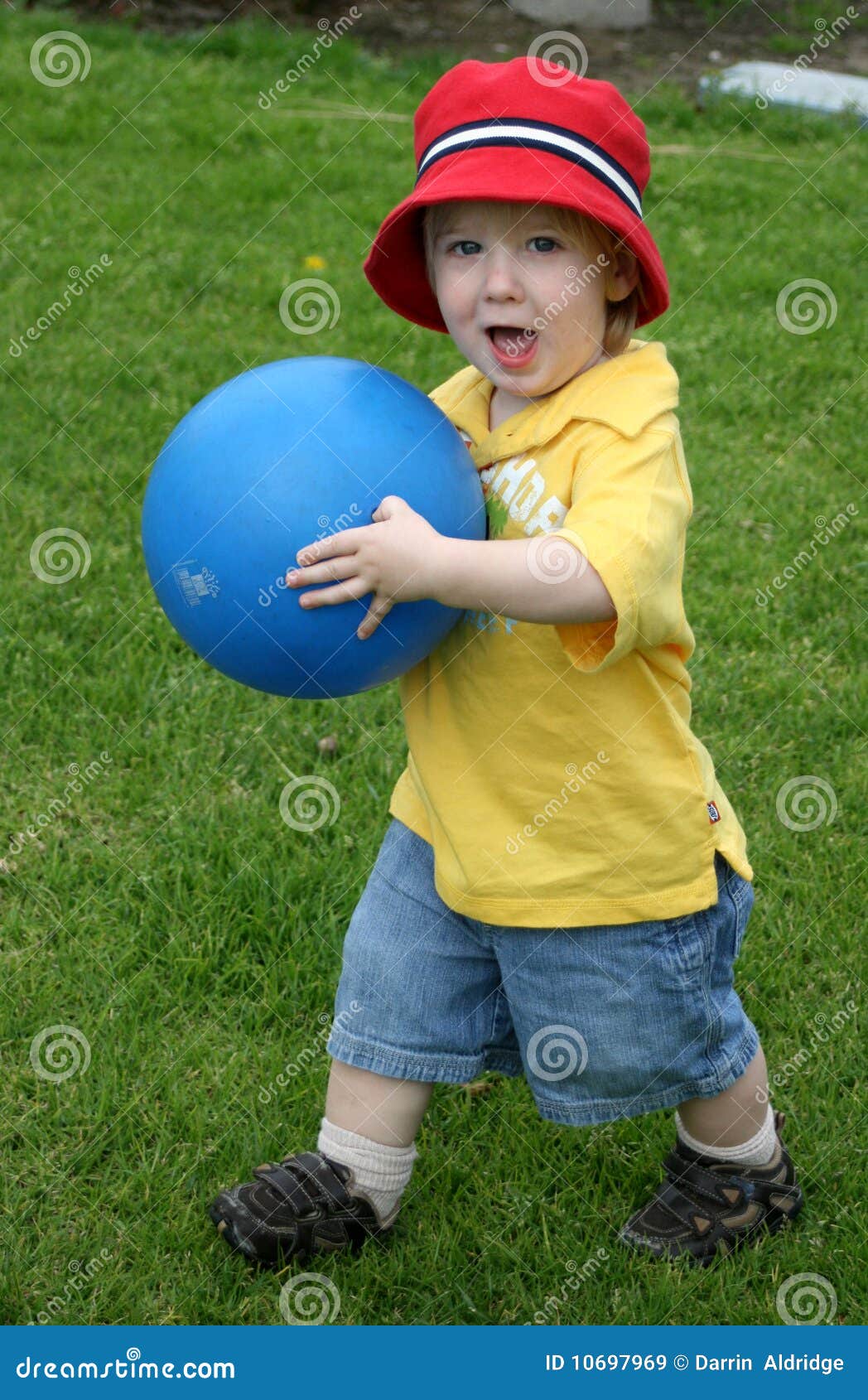 Young Boy Playing with Ball Stock Image - Image of happy, ball: 10697969