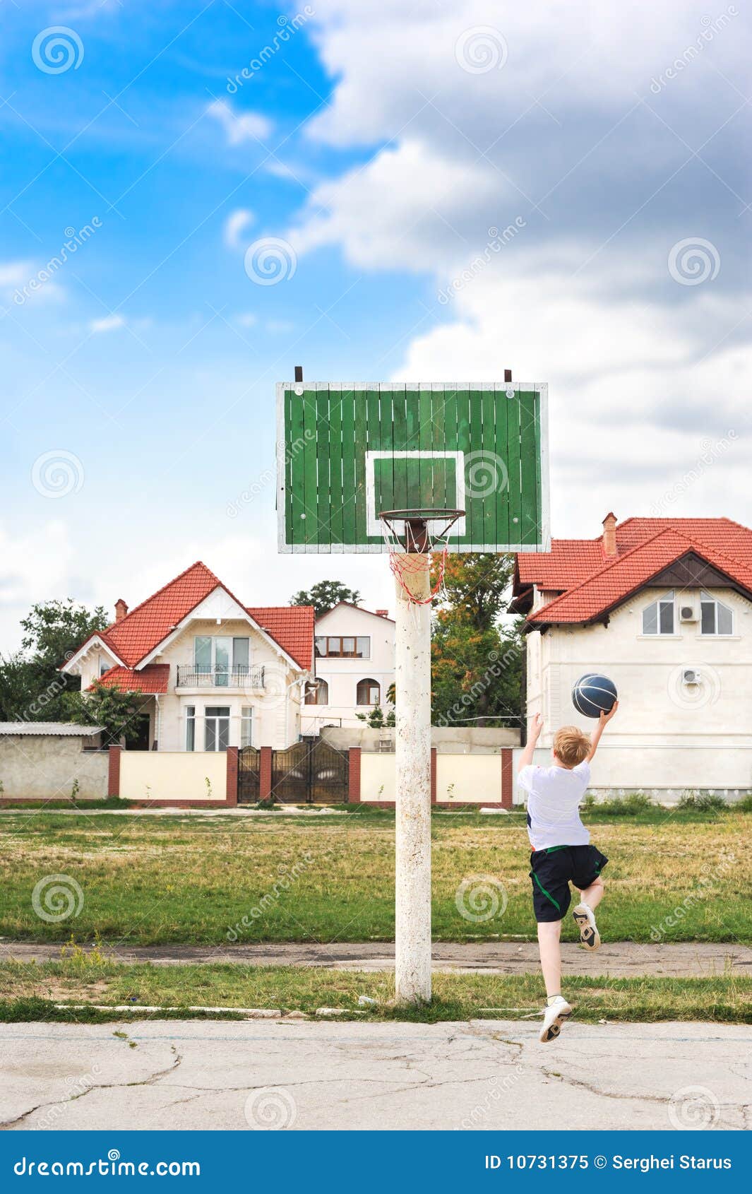 Young Boy Playing Basketball Alone Stock Image - Image of team, playing ...