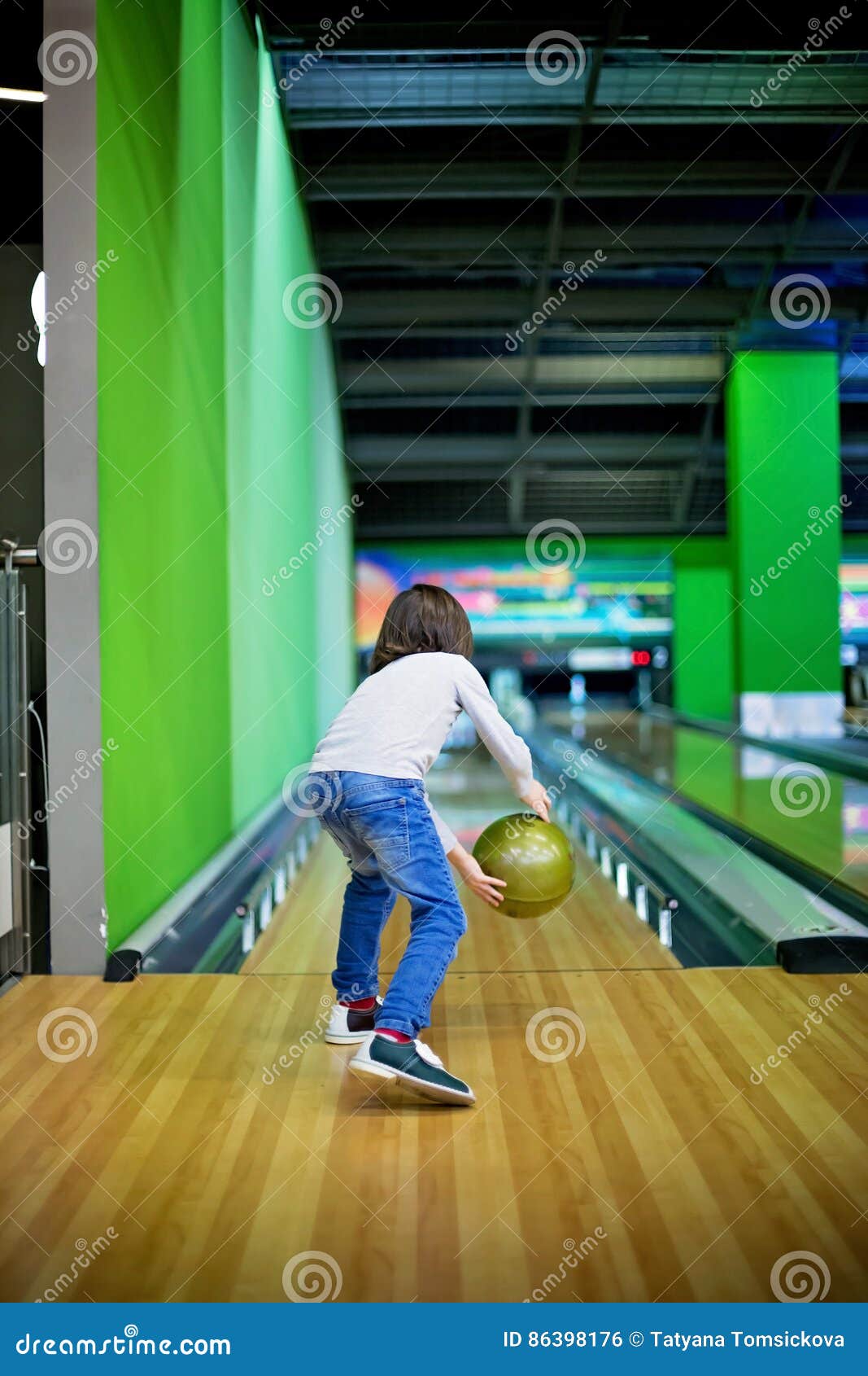 Young Boy, Playing Bowling Indoors Stock Photo - Image of strike, lane ...