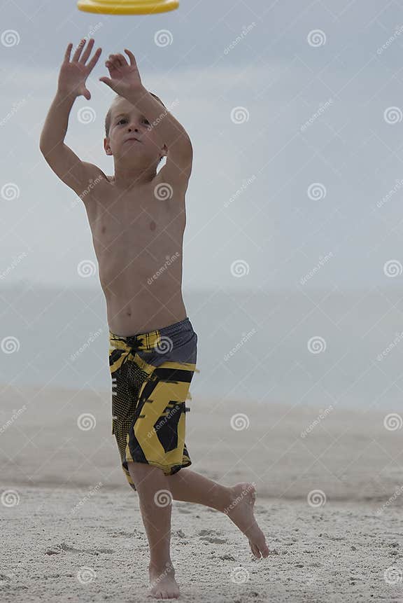 Young Boy Playing Catch on the Beach Great Focus Stock Image - Image of ...