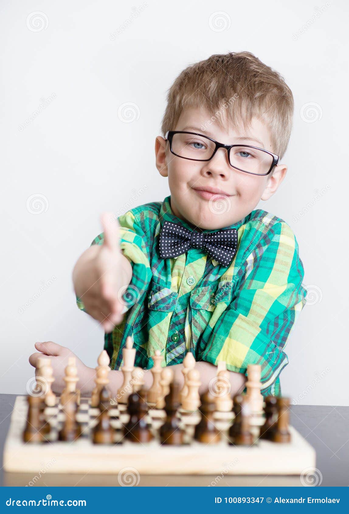 Young Boy Playing Chess, Offering Hand Stock Image - Image of ...