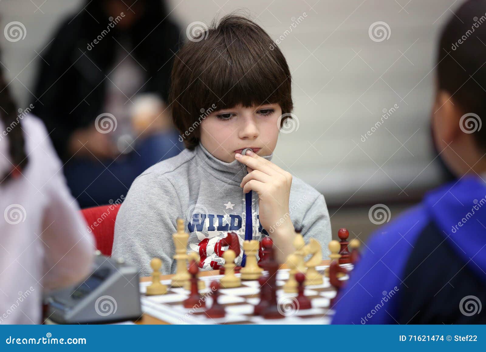 Young boy playing chess editorial stock image. Image of infant - 71621474