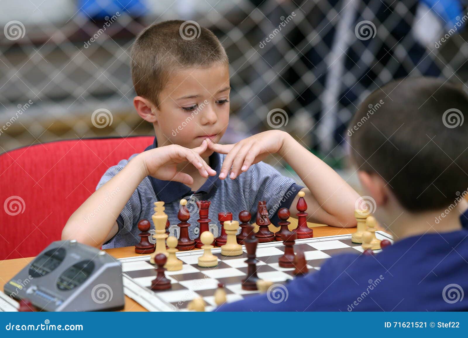 Young boy playing chess editorial photo. Image of concentration - 71621521