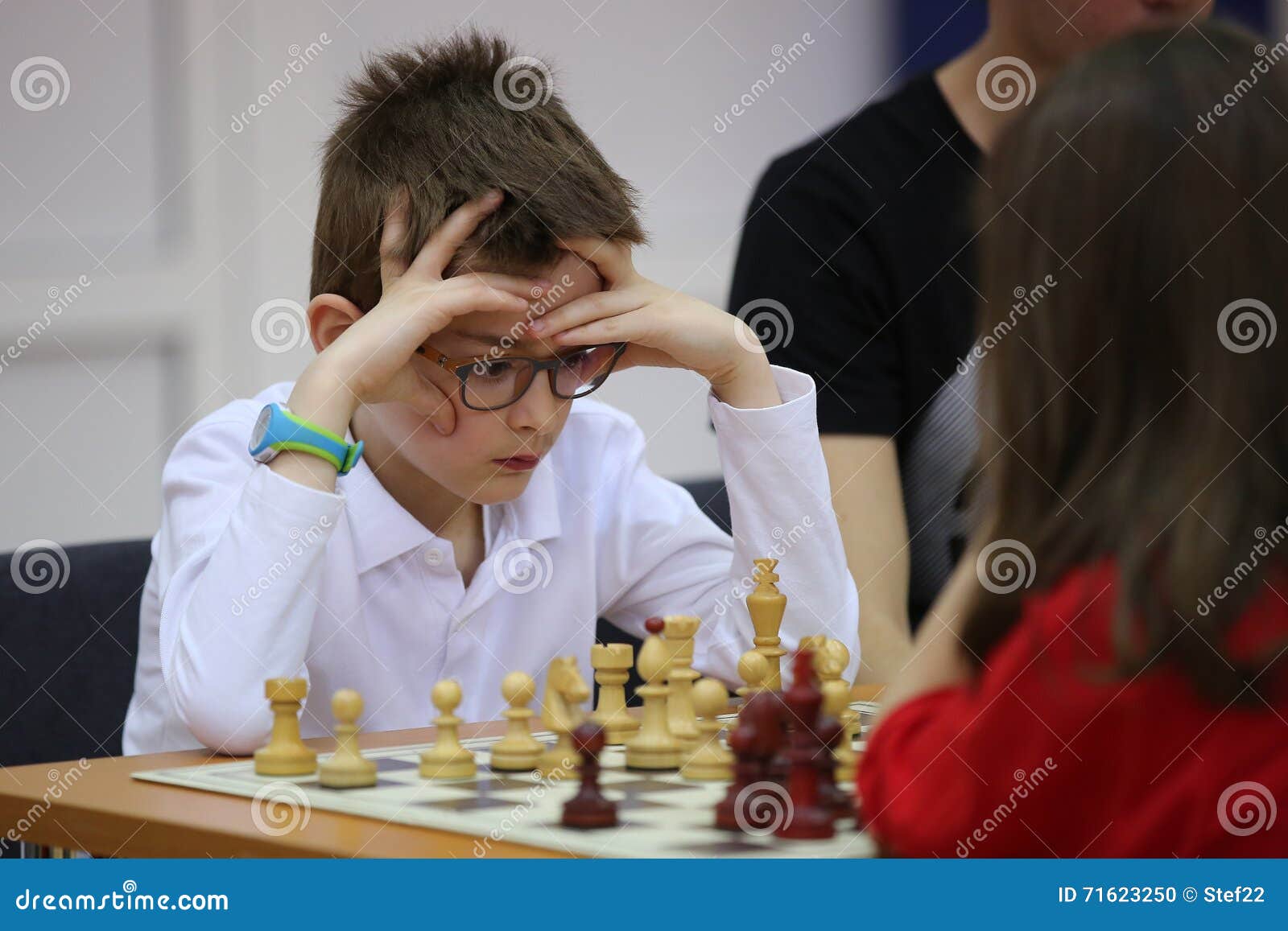 Young boy playing chess editorial image. Image of game - 71623250