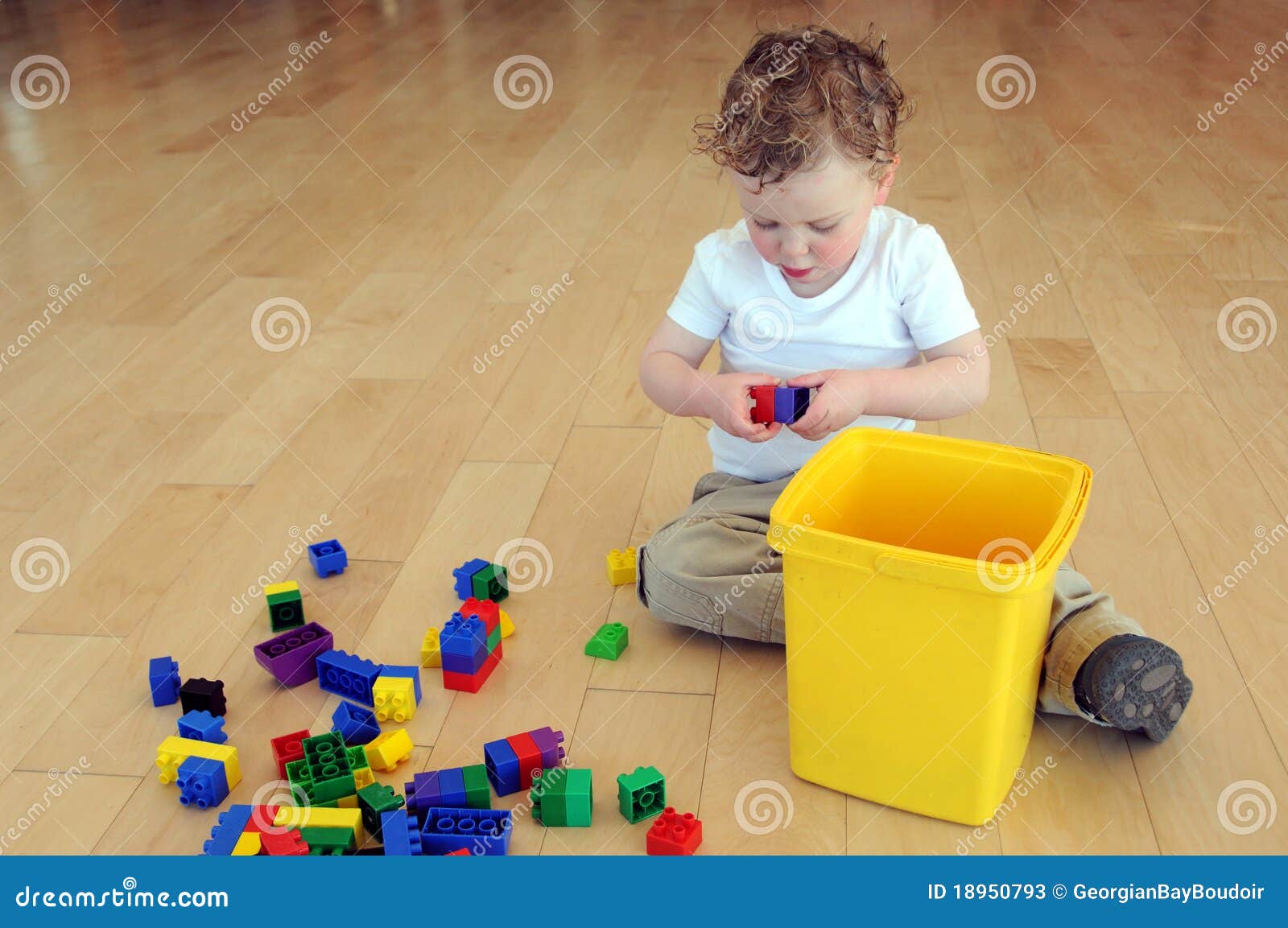 Young Boy Playing with Coloured Blocks Stock Image - Image of flooring ...